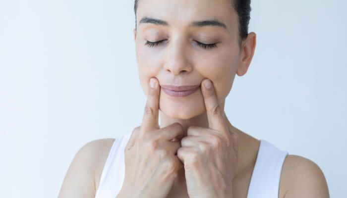 8 Best Face Yoga Exercises to Reduce Marionette Lines